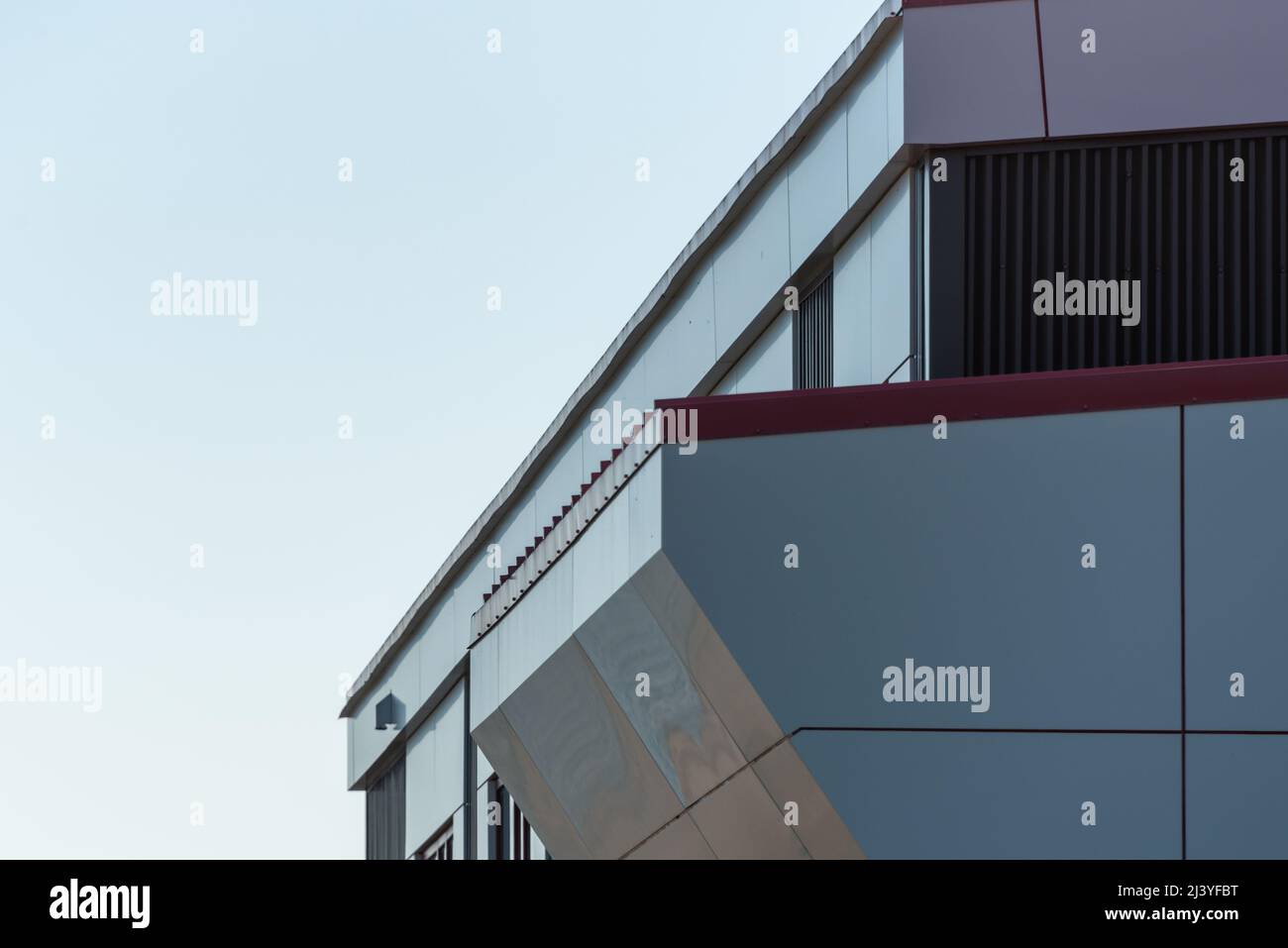 The exterior wall of a contemporary commercial style building with ...