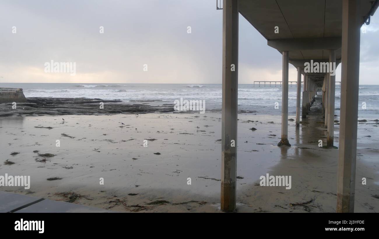 Ocean Beach pier in rainy weather, sea waves in foggy air, California ...