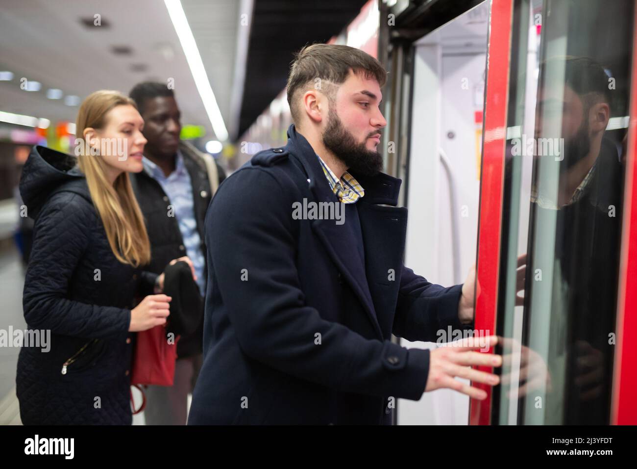 Man entering train hi-res stock photography and images - Alamy