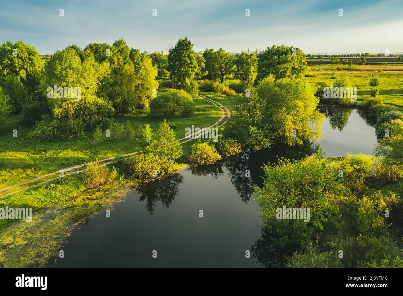 Spring landscape with river Stock Photo - Alamy