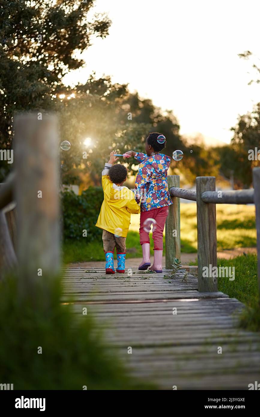 Theyre adventurous siblings. Shot of a little brother and sister ...