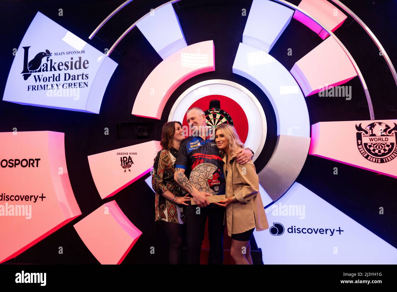 Neil Duff celebrates with his wife and daughter and the trophy after ...
