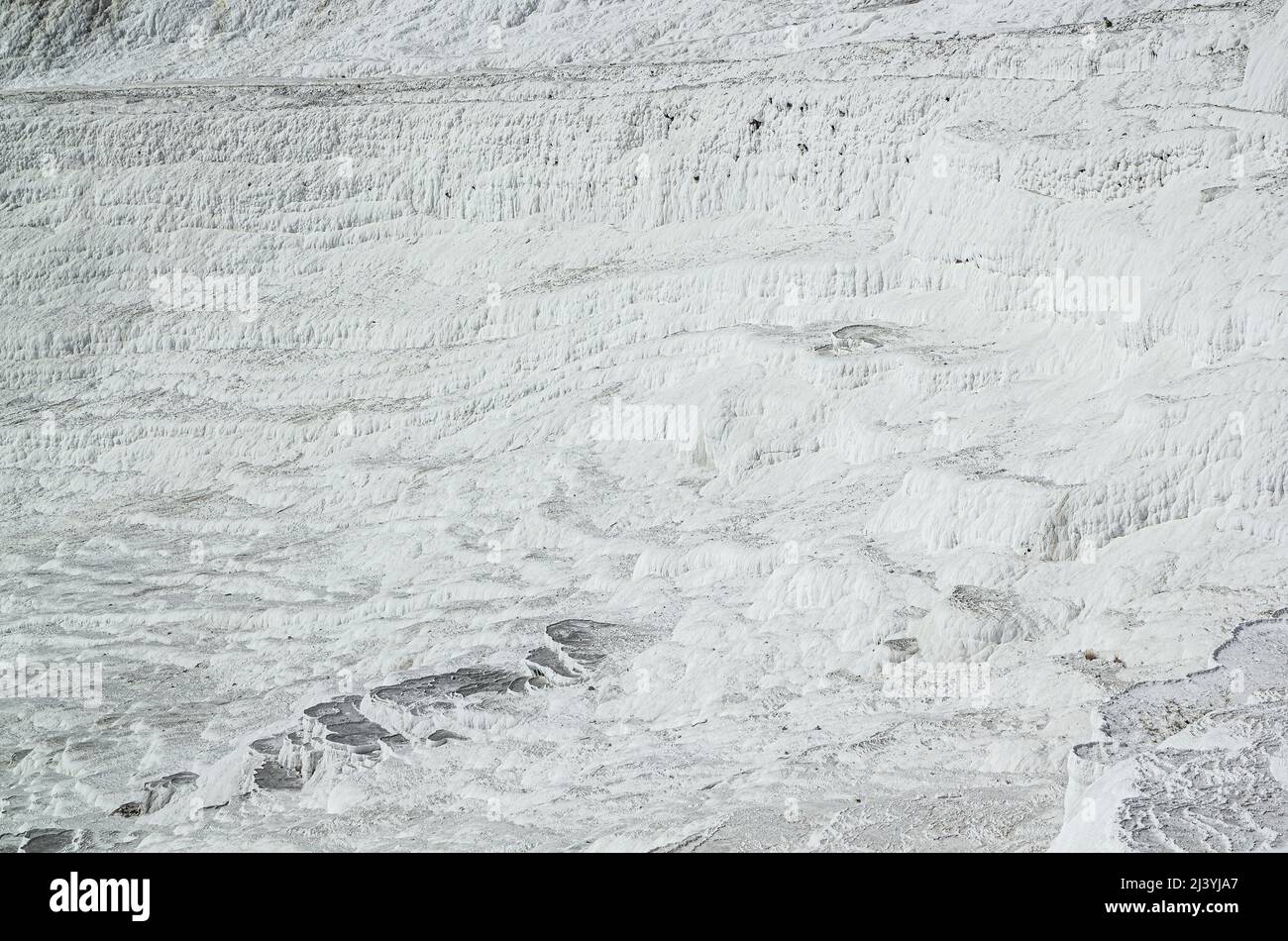 Stone texture covered with calcium deposits. Pamukale texture. Light ...