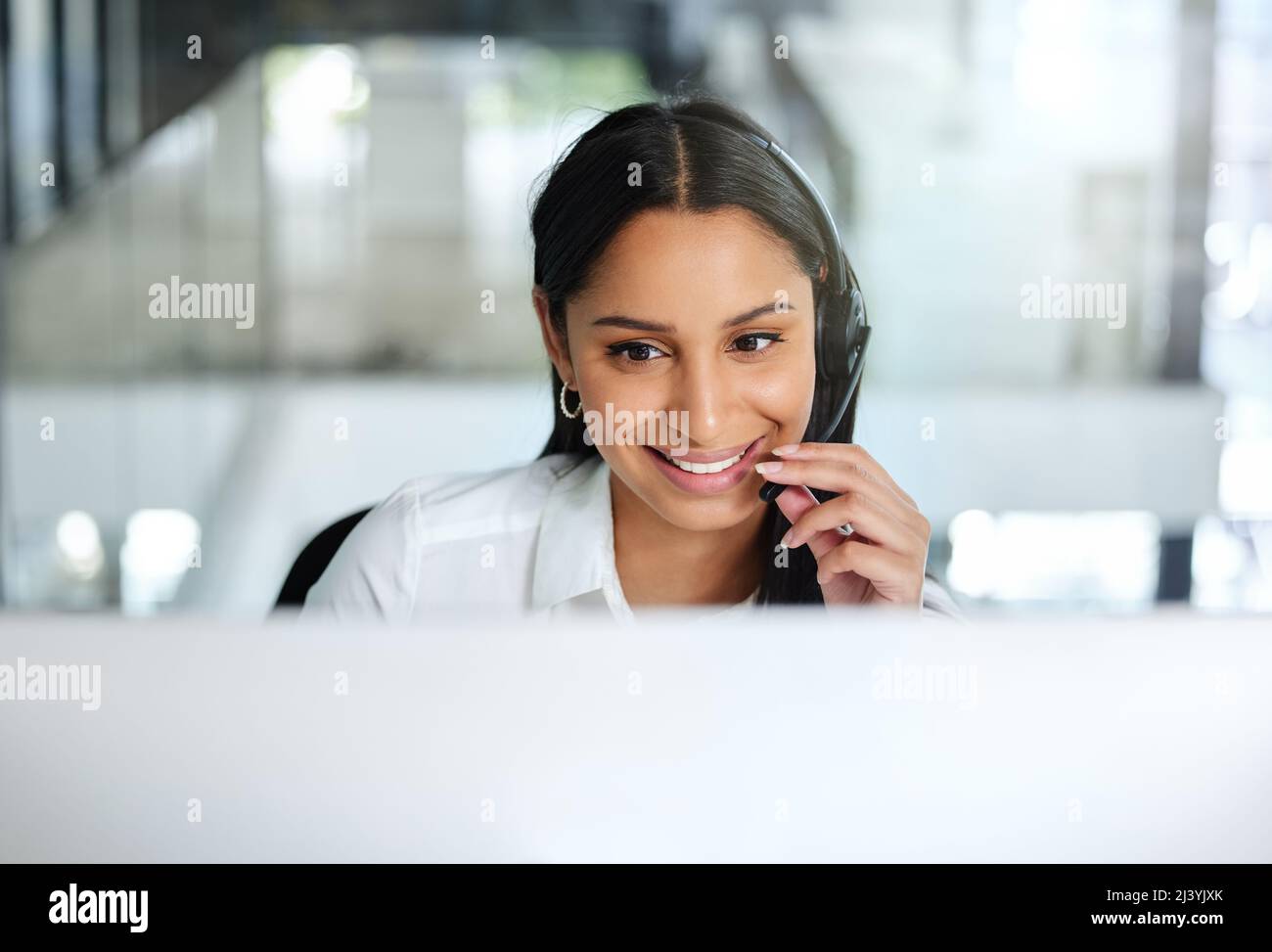 Glad female employee in hi-res stock photography and images - Alamy