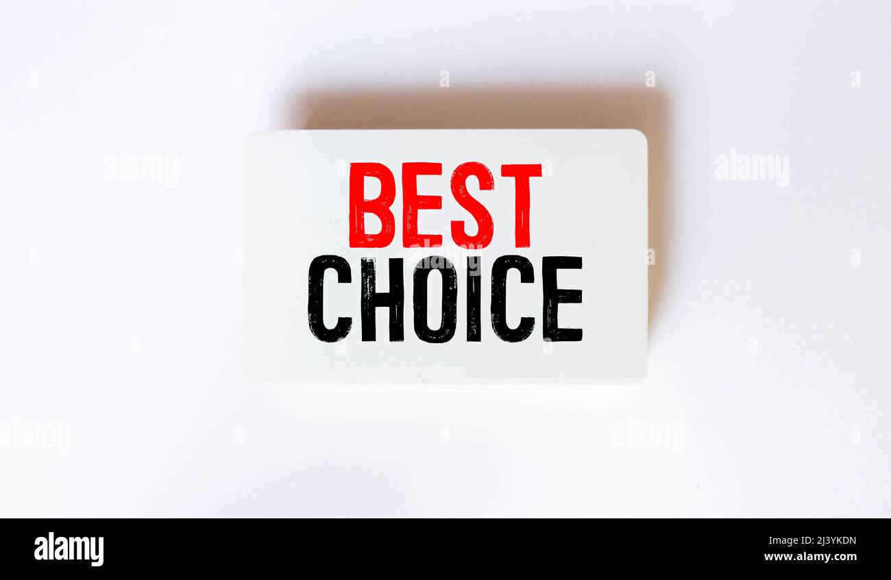 best choice sign a paper price tag against rustic red painted barn wood ...