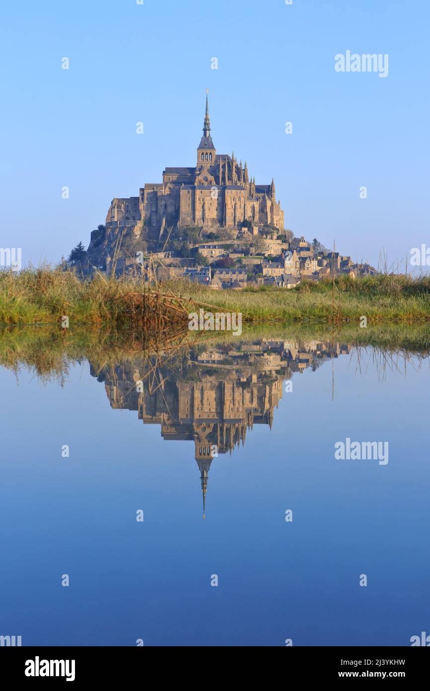Water reflection of Mont-Saint-Michel (Saint Michael's Mount), a ...