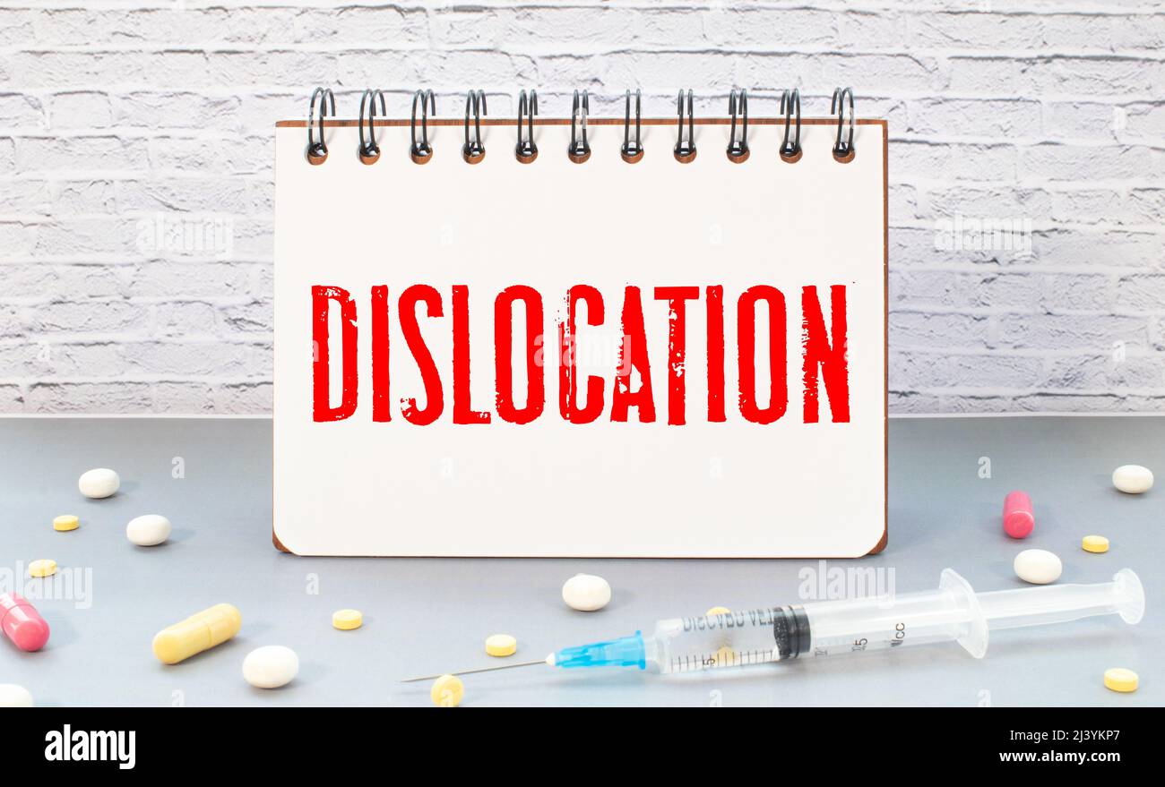 Grey stethoscope and paper plate with a sheet of white paper with text ...