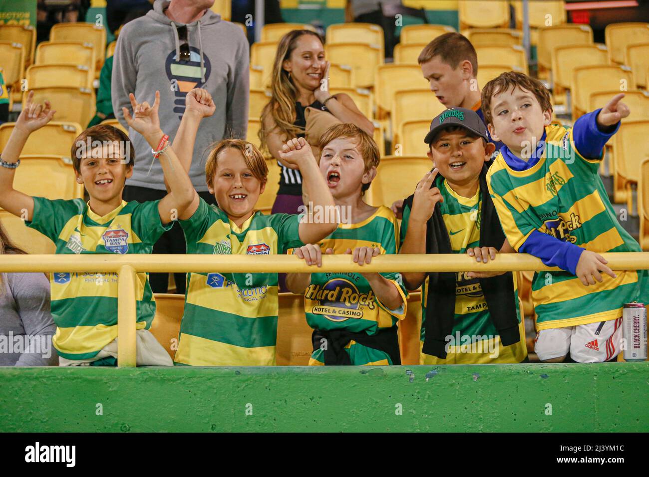 St. Petersburg, FL: A group of young Tampa Bay Rowdies fans cheer for ...
