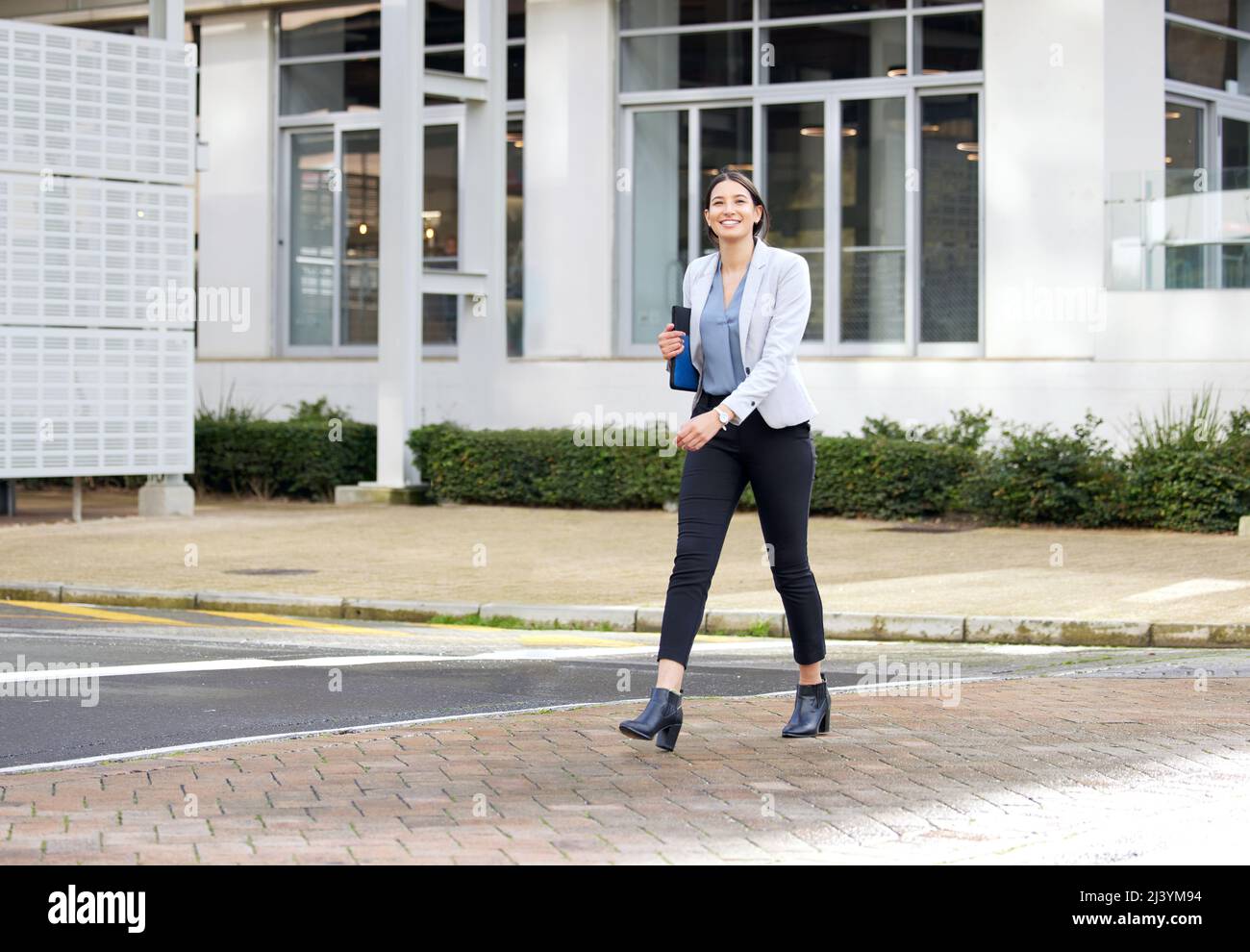 Taking strides toward my destiny. Shot of a young businesswoman ...