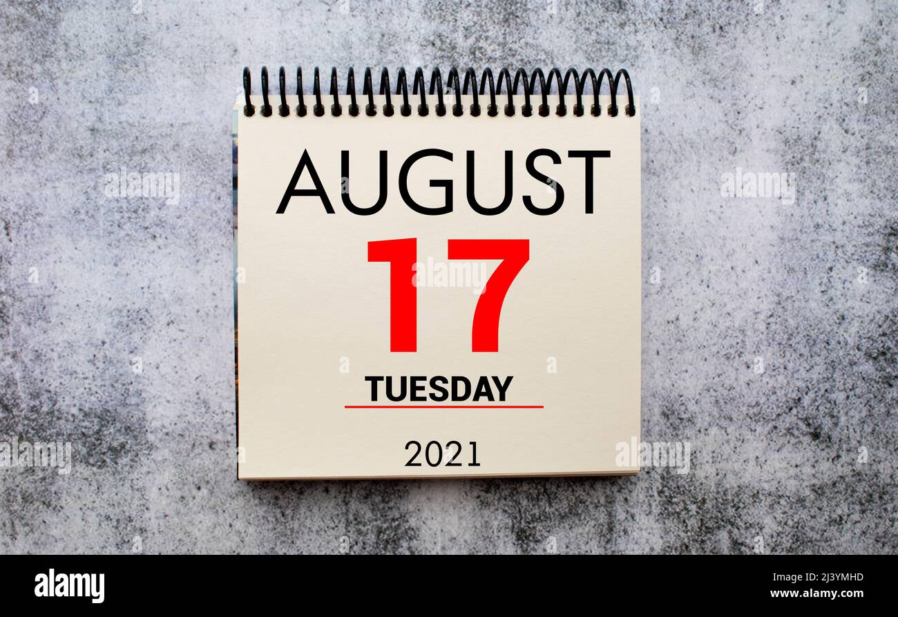 Save the Date written on a calendar - August 17 Stock Photo - Alamy