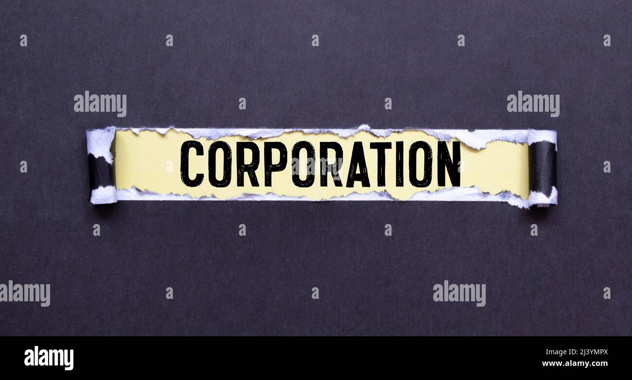 Motivational words: corporate bonds. Man holds a piece of paper with ...