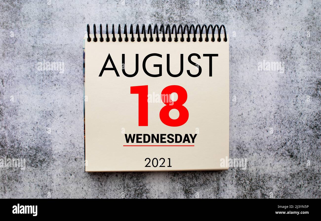 Save the Date written on a calendar - August 18 Stock Photo - Alamy