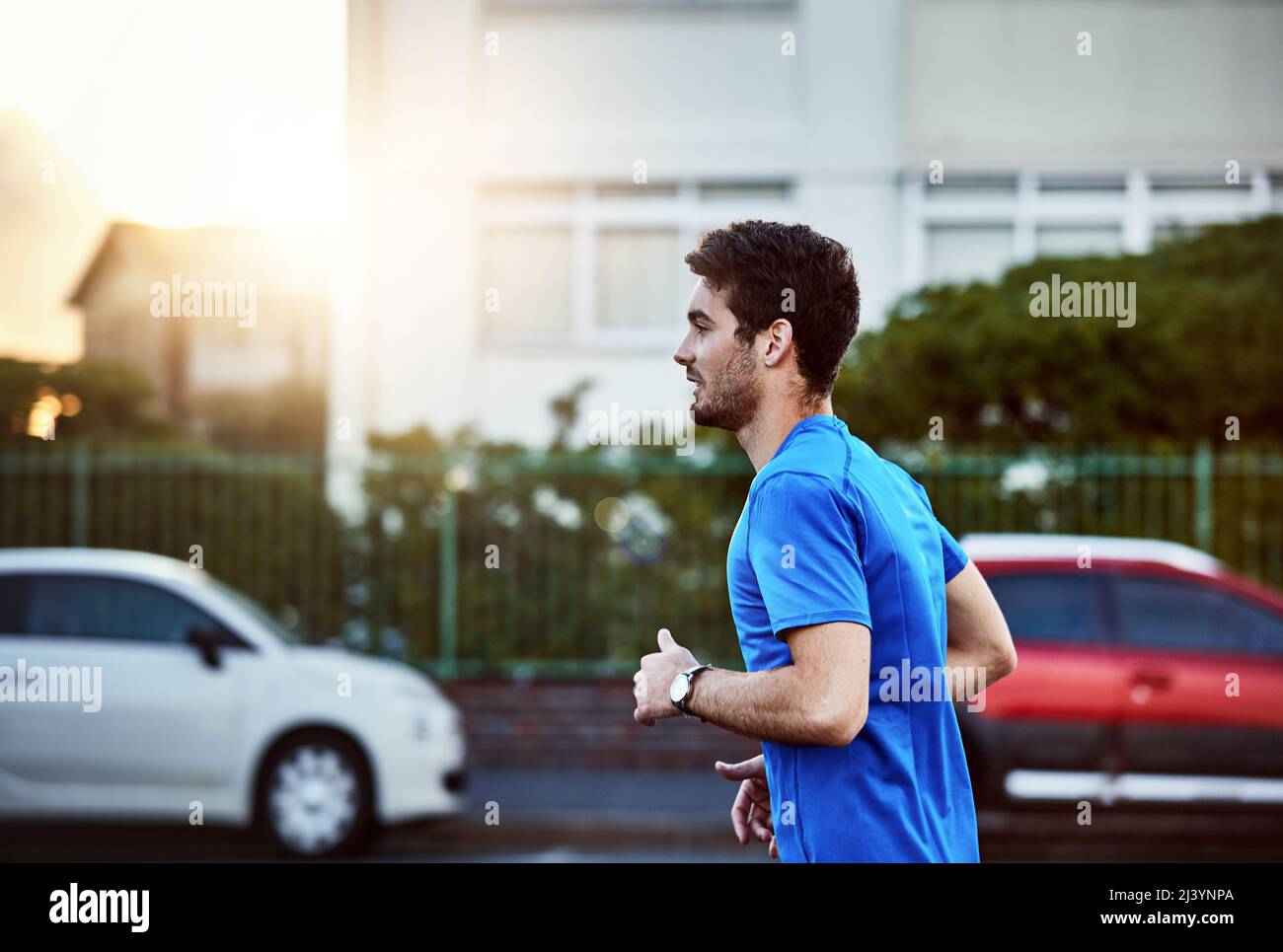 Remember to always push forward. Shot of a sporty young man out for a ...