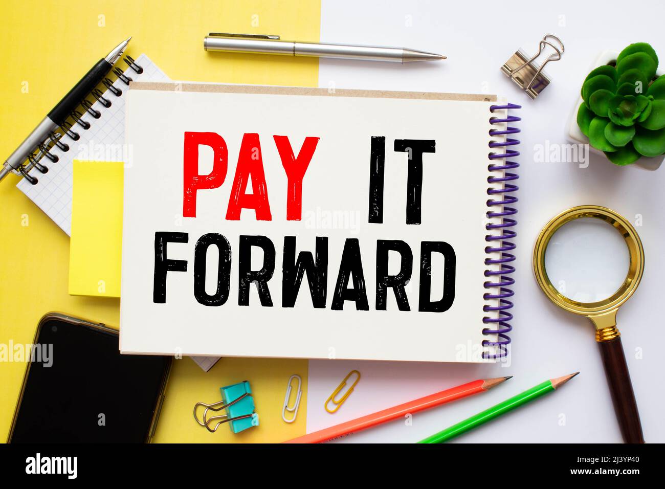 Blank sheet, pen and glasses on grey table. PAY IT FORWARD text Stock ...