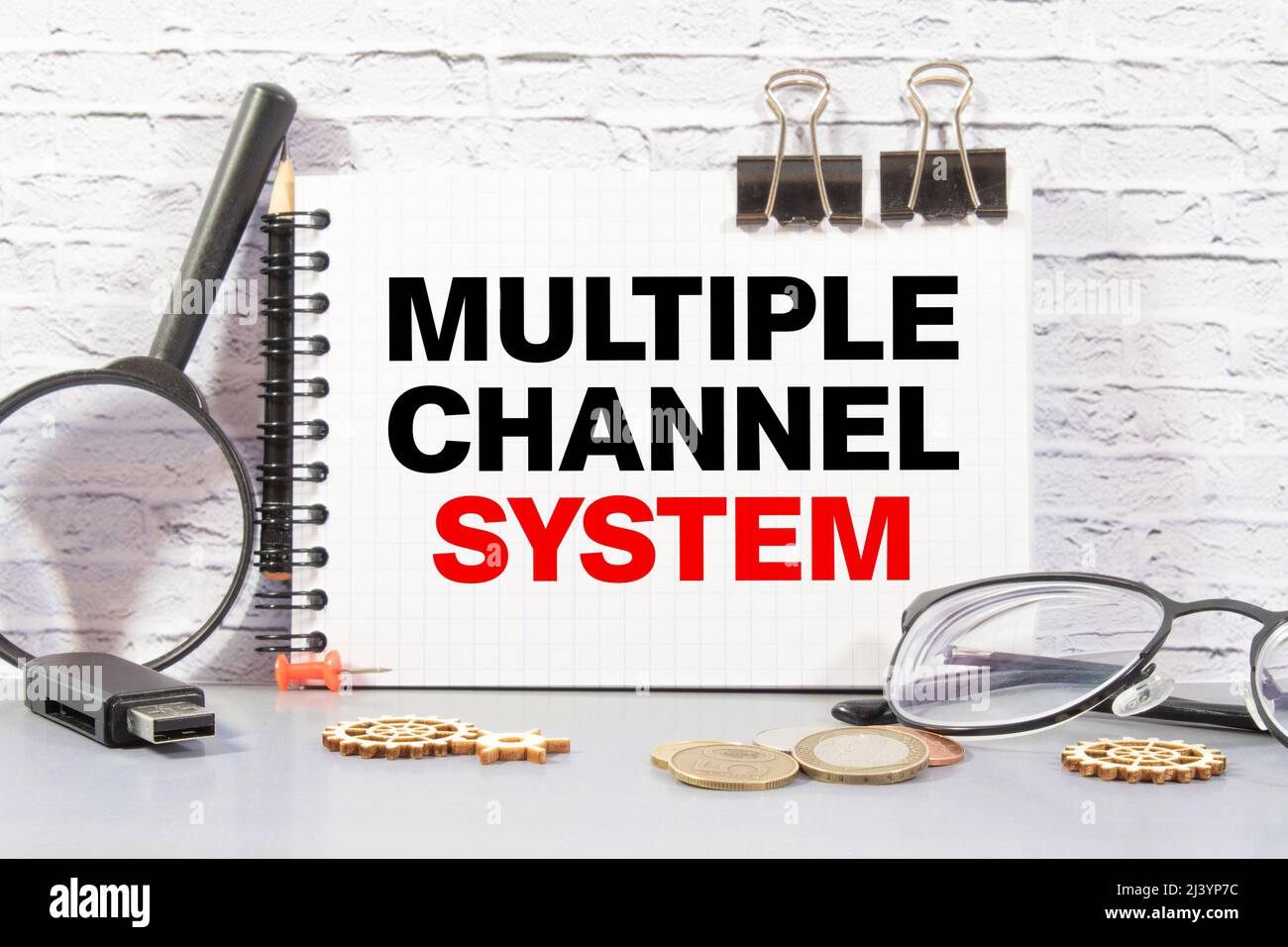 text Multiple Channel System on white business noteboock, concept Stock ...