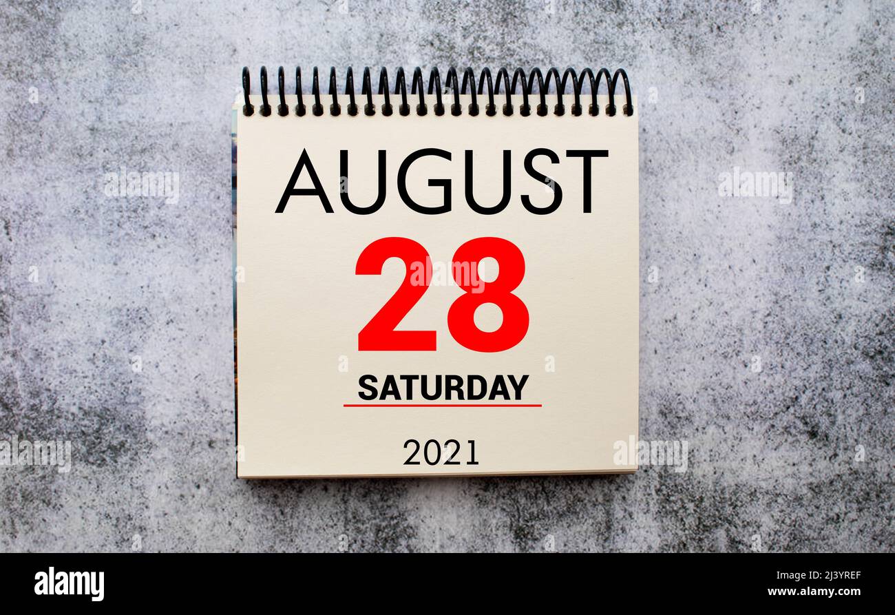 Wall calendar with a red pin - August 28 Stock Photo - Alamy