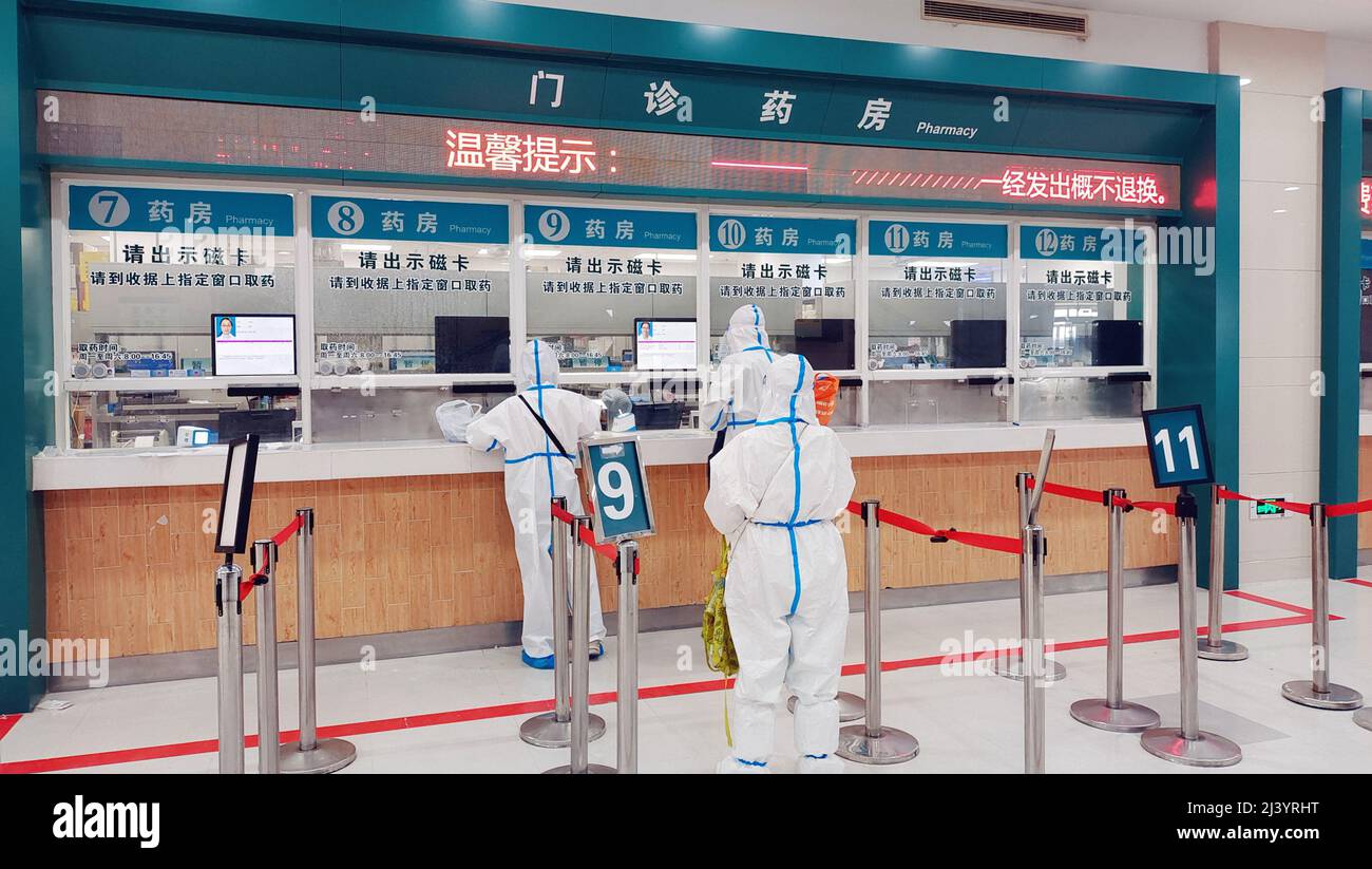 SHANGHAI, CHINA - APRIL 8, 2022 - Volunteers carry medical insurance ...