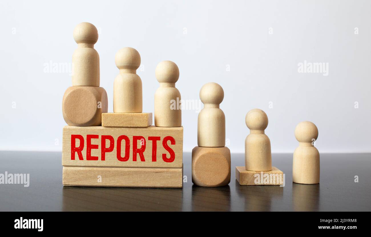 The word quarterly report on a white background with a yellow folder ...