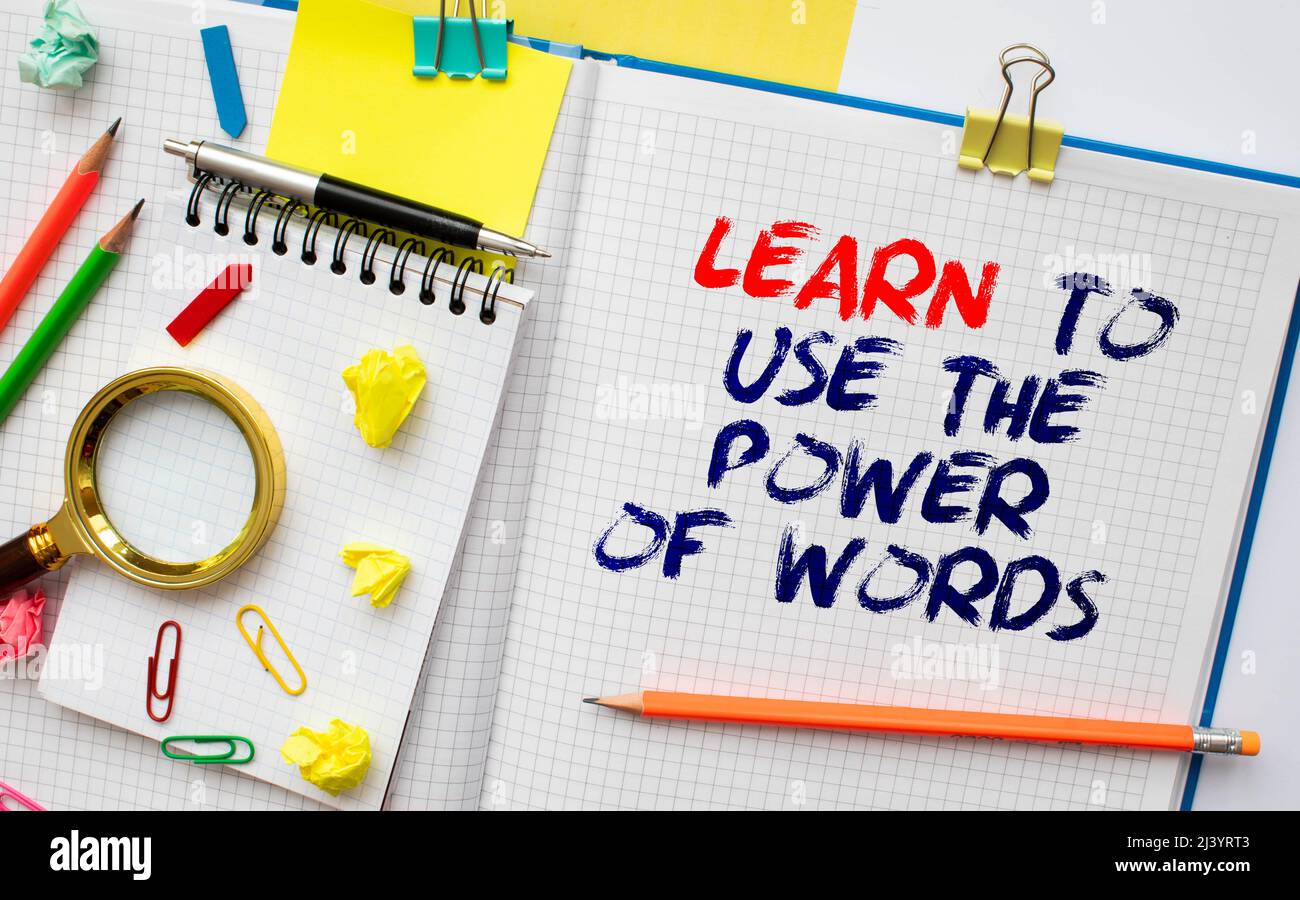 Learn to use the power of words on notebook Stock Photo - Alamy