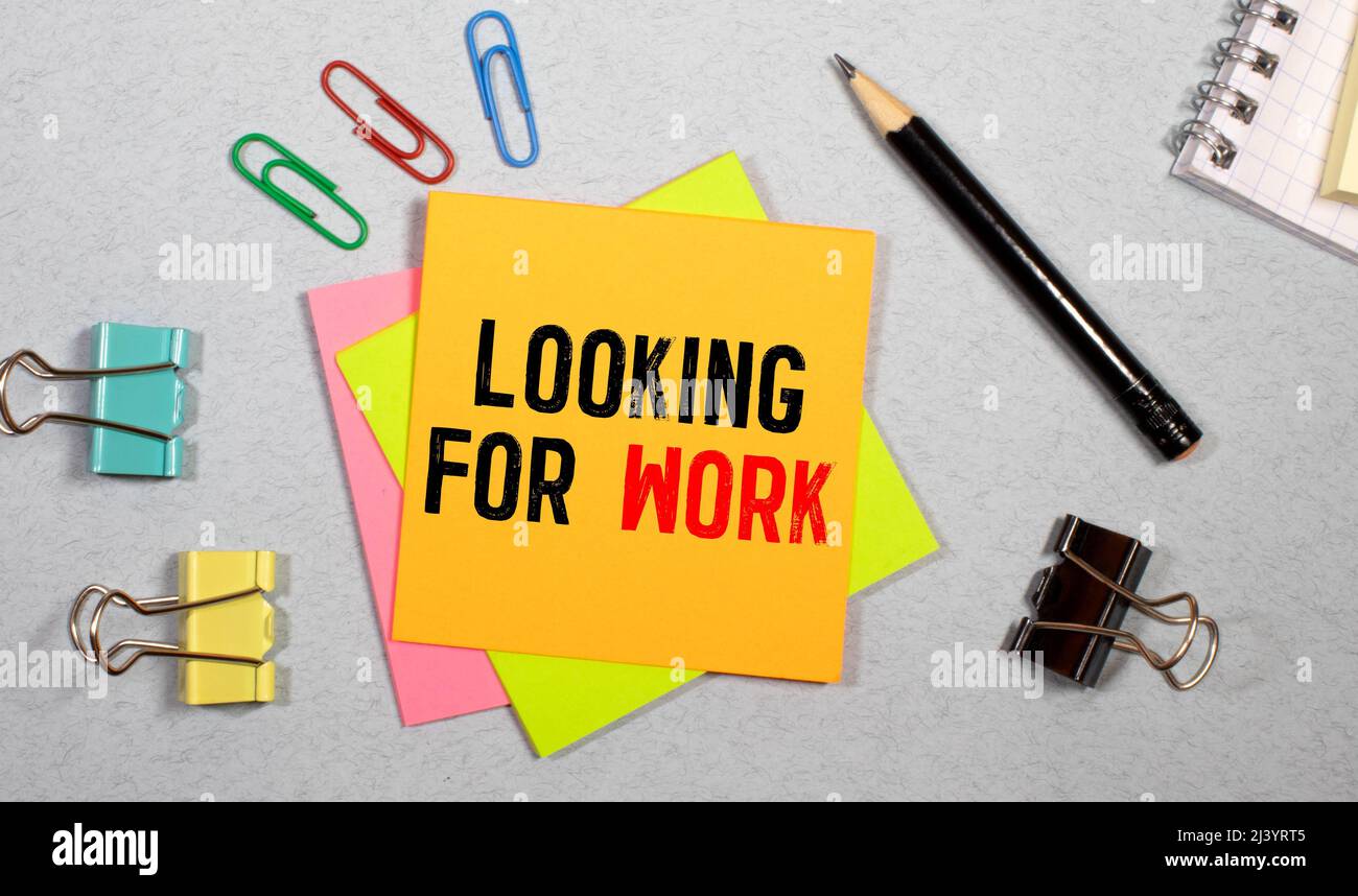 cardboard sign that text LOOKING FOR WORK Stock Photo - Alamy