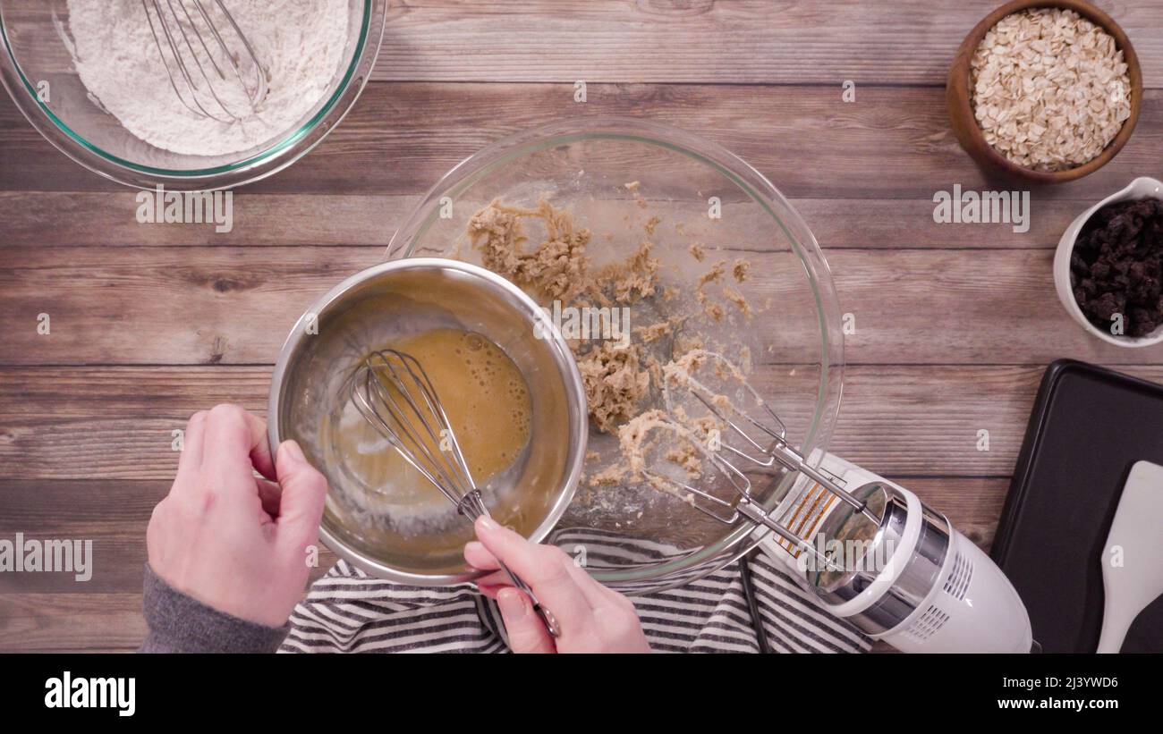 Flat lay. Step by step. Mixing ingredients to bake oatmeal raising ...
