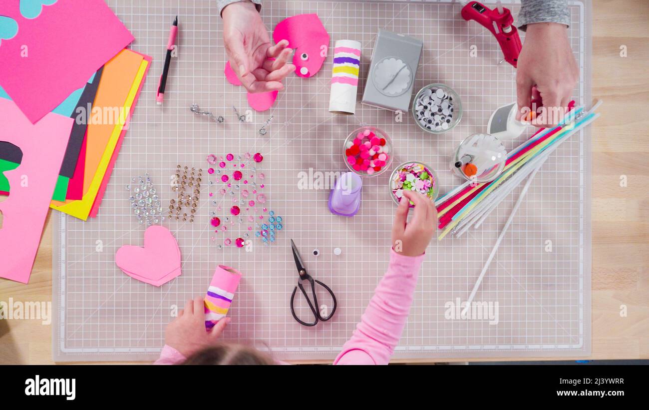 Flat lay. Kids papercraft. Making paper bugs out of the empty toilet ...