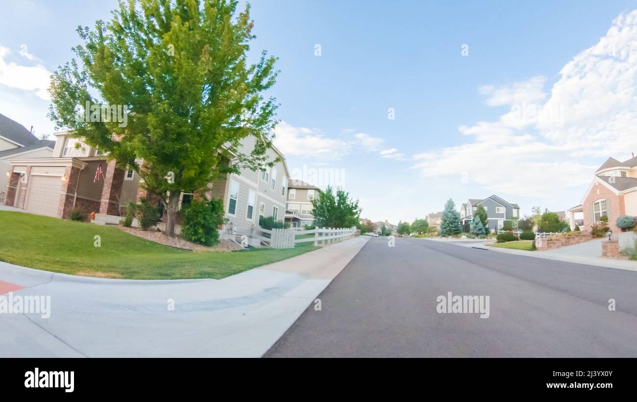 View of the typical suburban neighborhood on a summer morning Stock ...