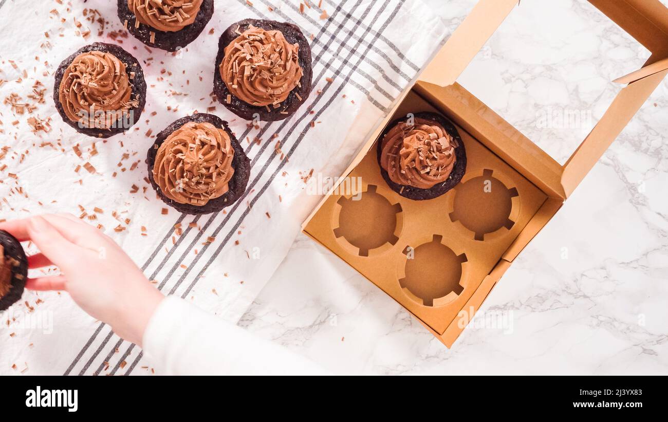 Flat lay. Step by step. Packaging chocolate cupcakes with chocolate ...
