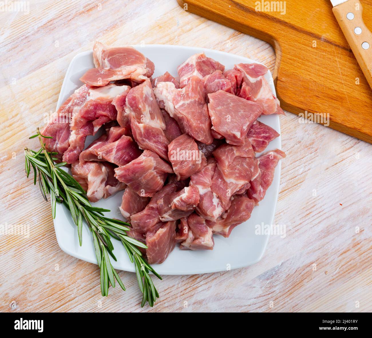 Uncooked chopped pork for stew Stock Photo - Alamy