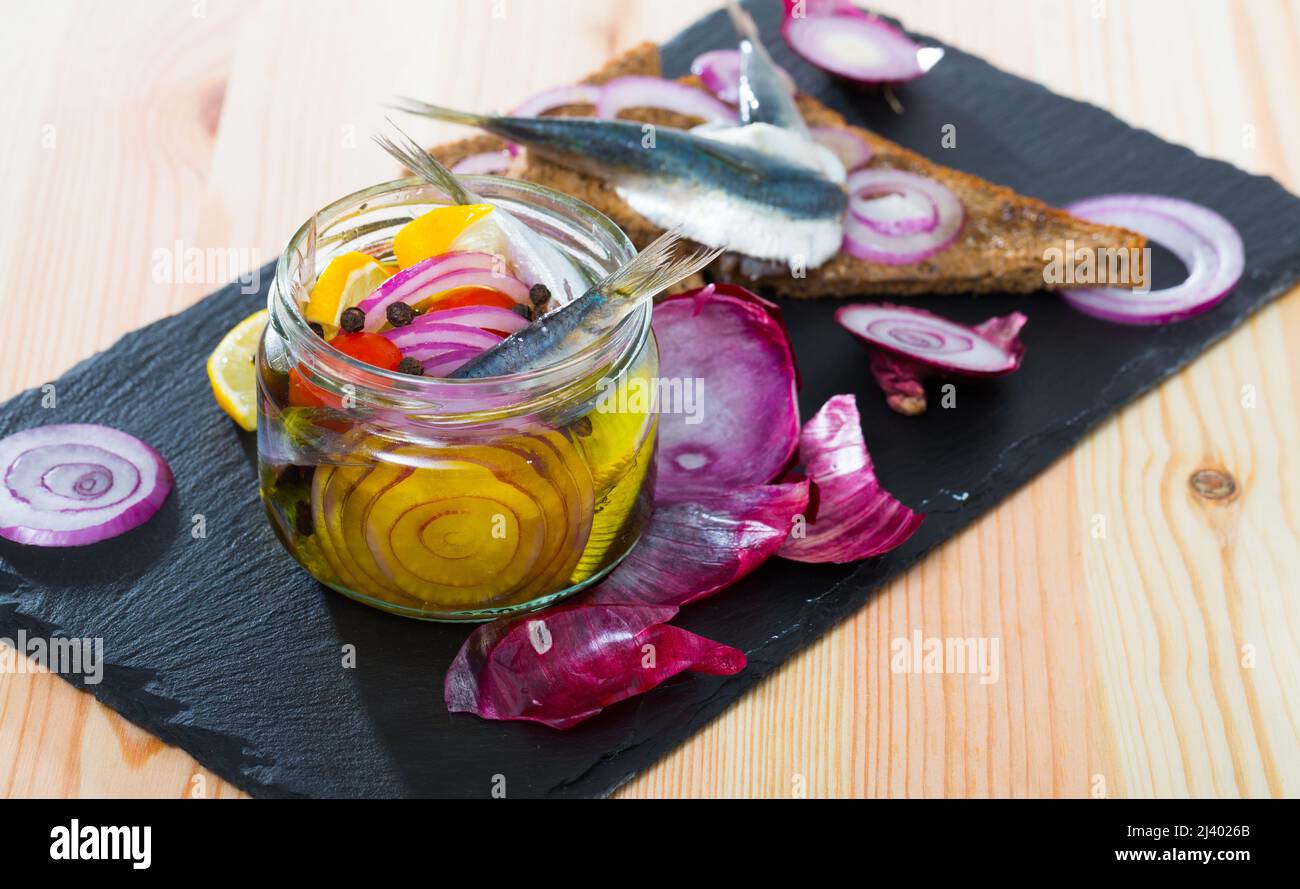 Homemade pickling pilchards Stock Photo - Alamy