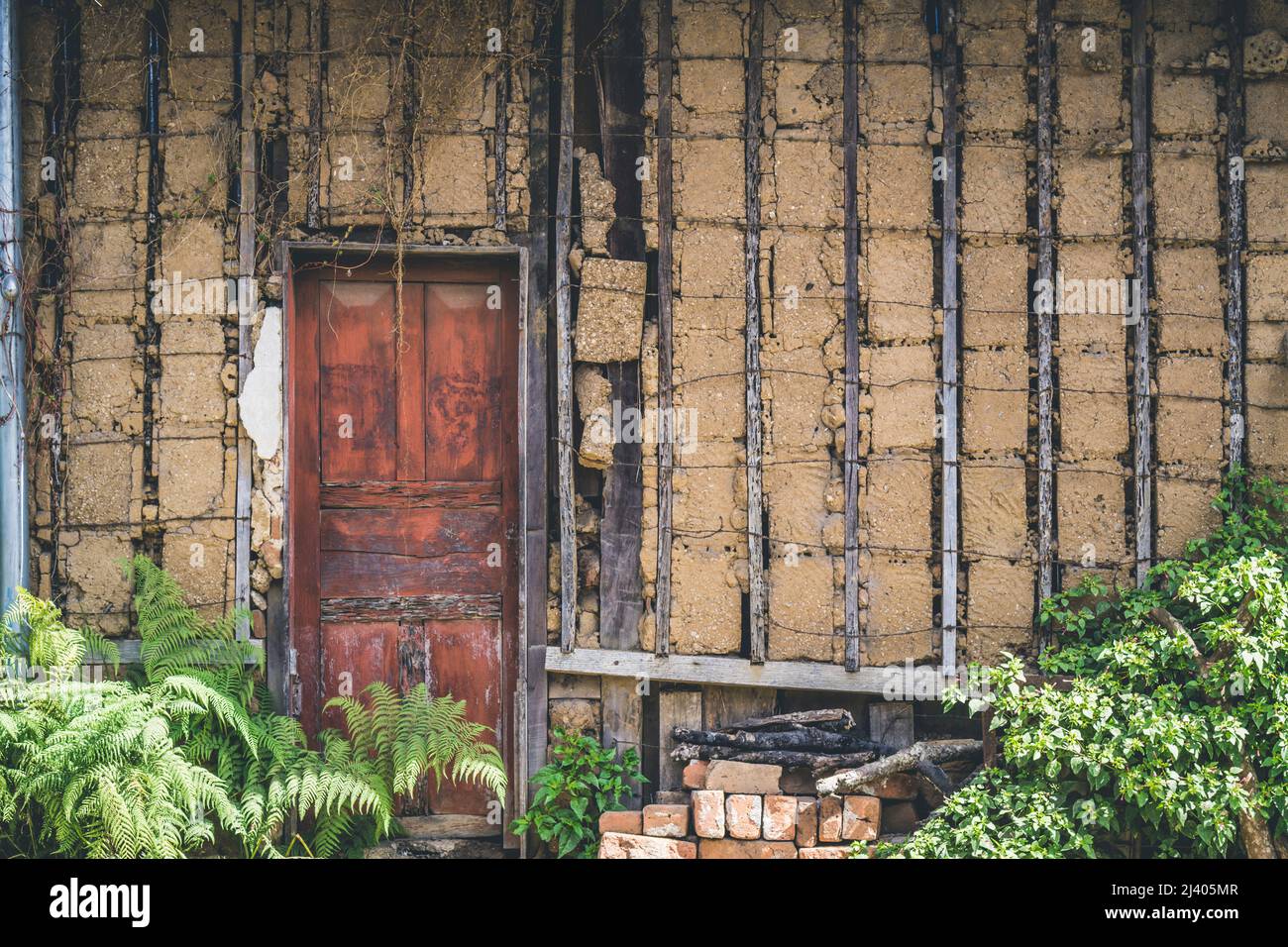 Old abandoned house that was in the process of building with exposed ...