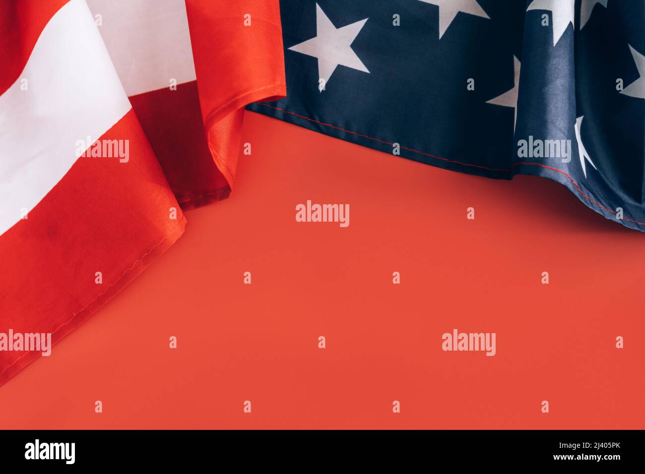 Folded USA flag on a red background Stock Photo - Alamy
