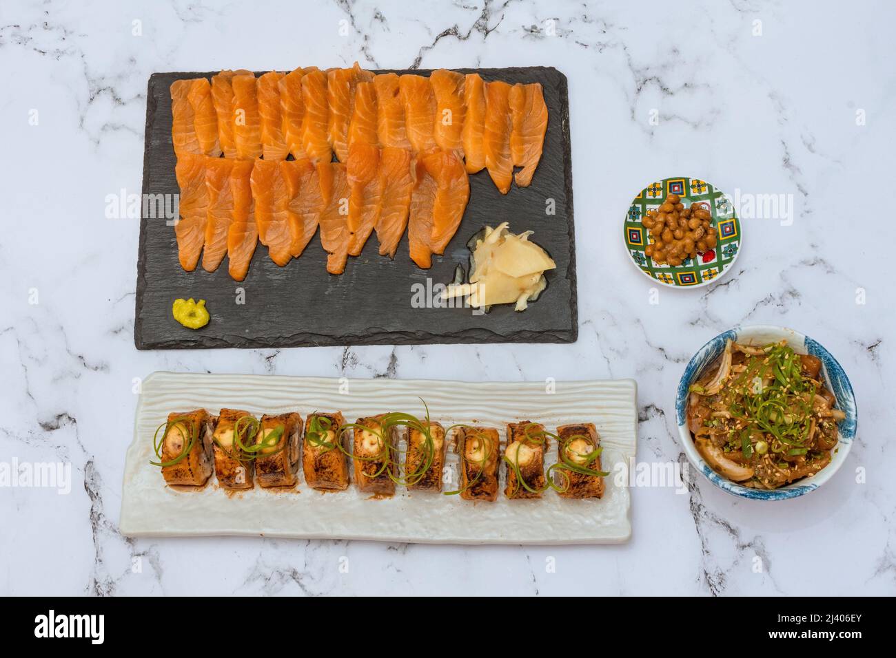 Salmon Sushi Rolls Platted On A White Marble Table. Image can be ...