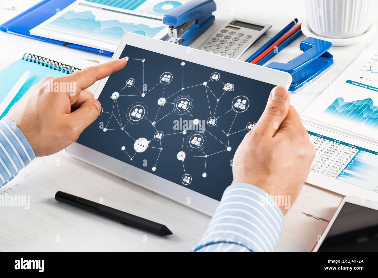 Men's hands hold a computer tablet Stock Photo - Alamy