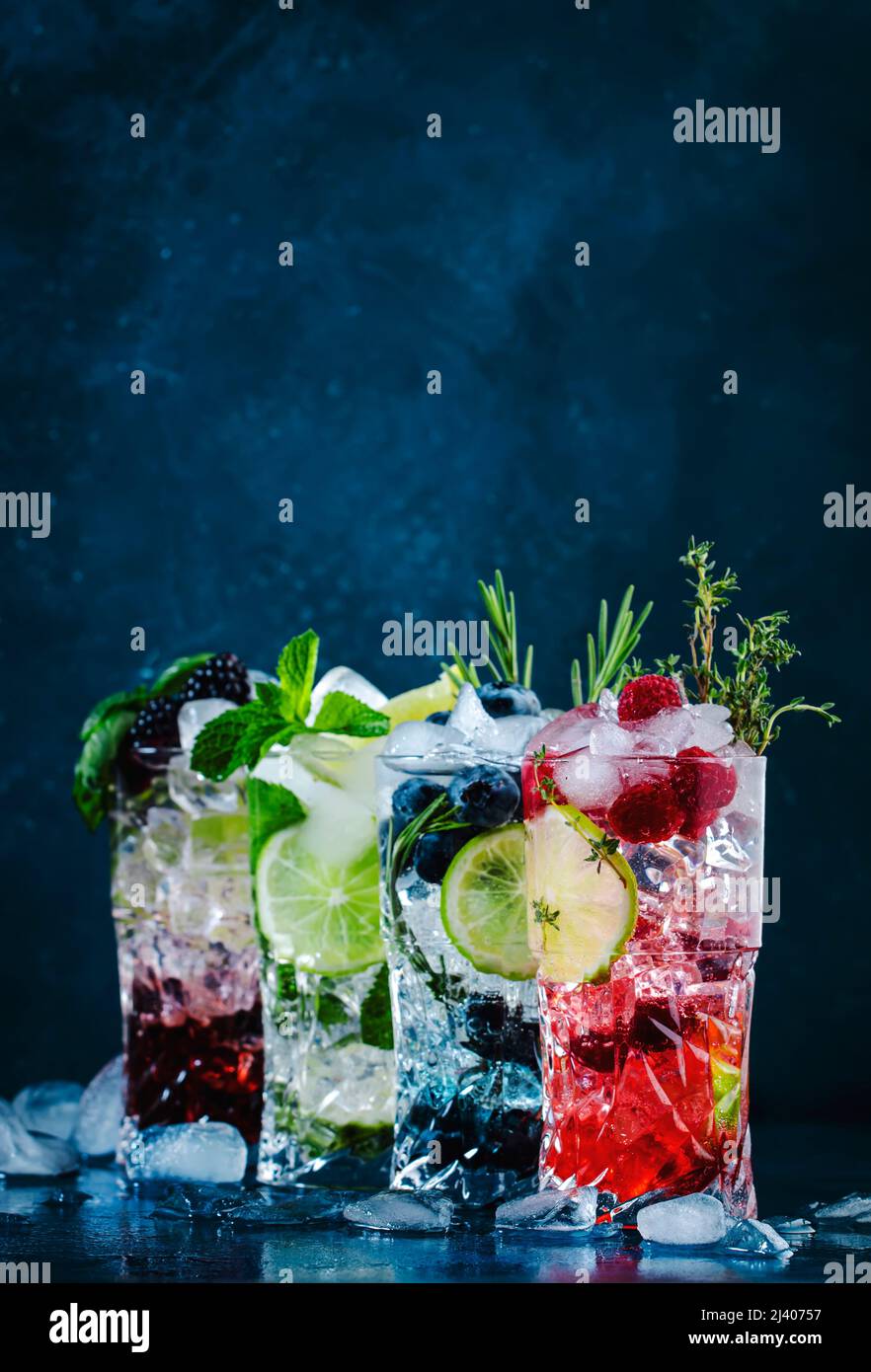 Cold summer cocktails drinks. Classic alcoholic long drink and mojito ...