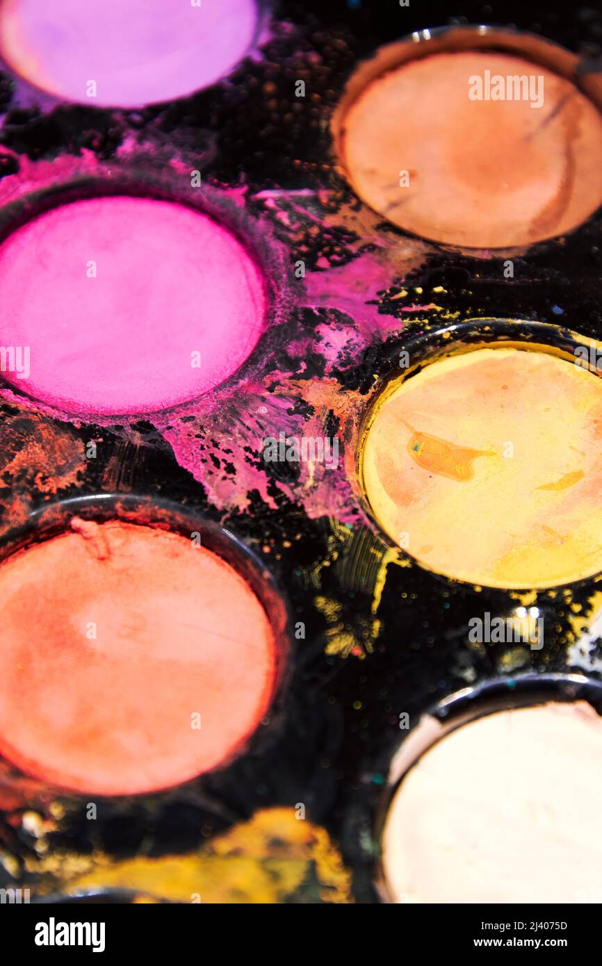 Vertical image with colorful paints and color splashings. Arts and ...