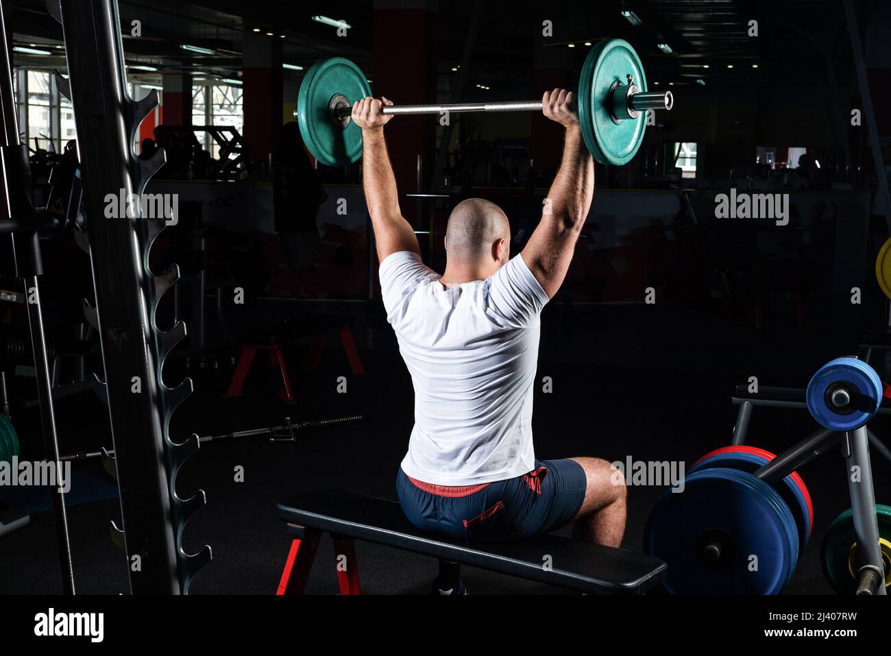 Young athlete lifts heavy barbell hi-res stock photography and images ...