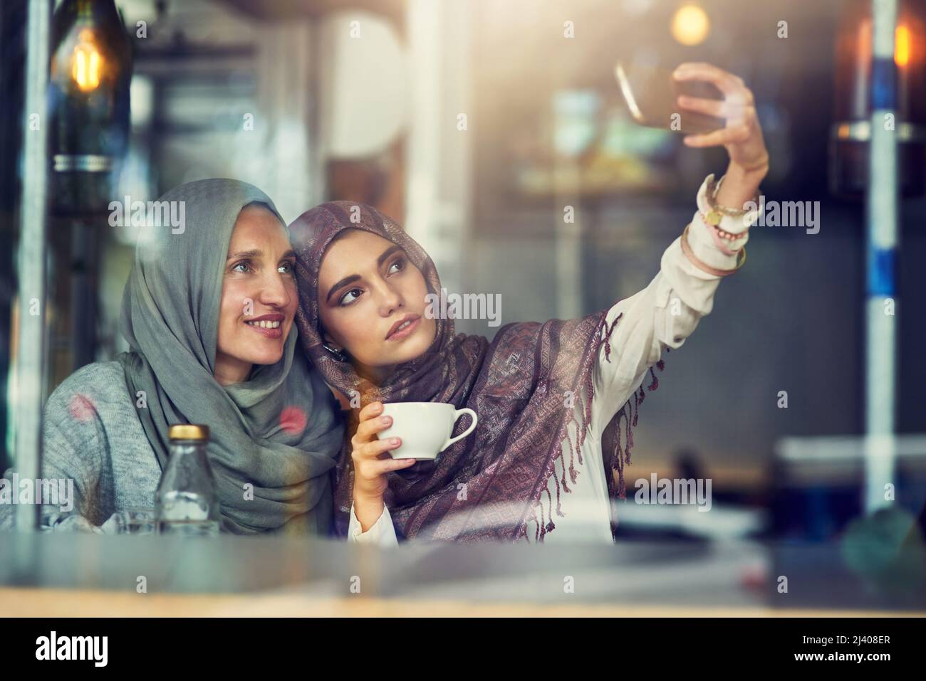 Whats better than coffee A best friend. Shot of two women taking ...