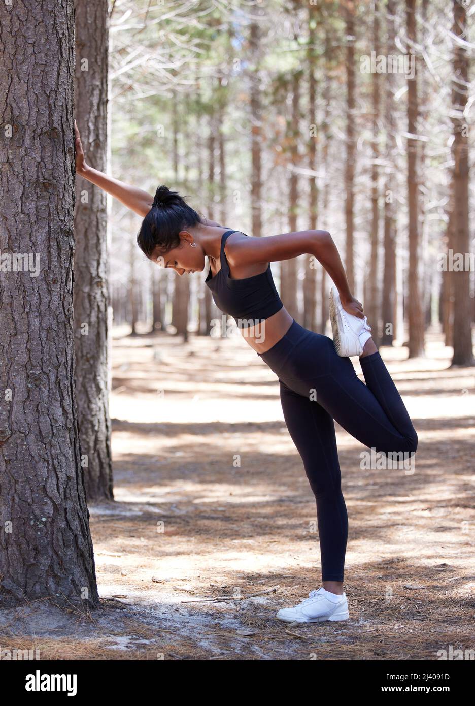 Stiff muscles are never welcome. Shot of an attractive young woman ...