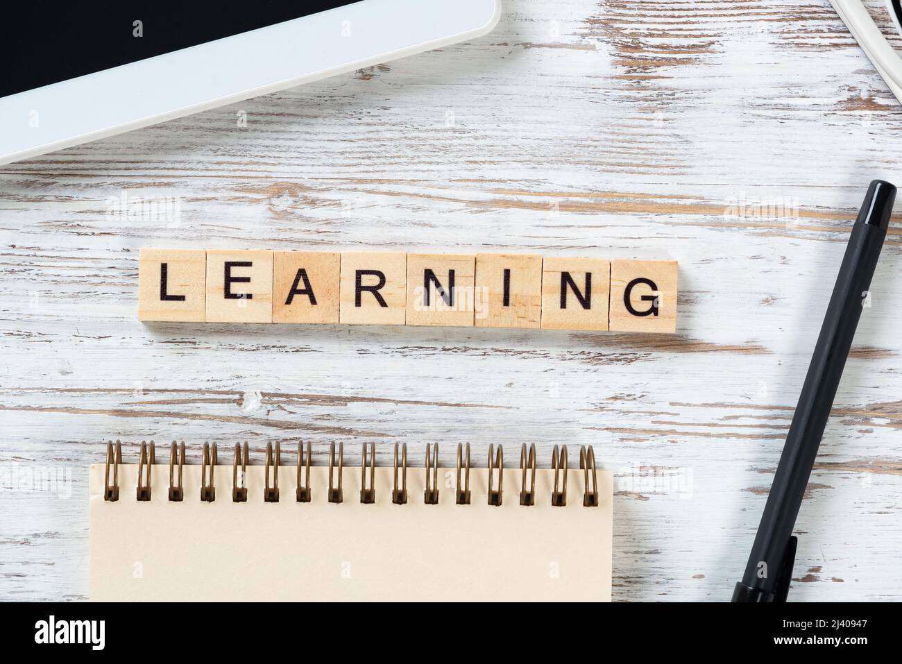 Learning and development concept with letters Stock Photo - Alamy