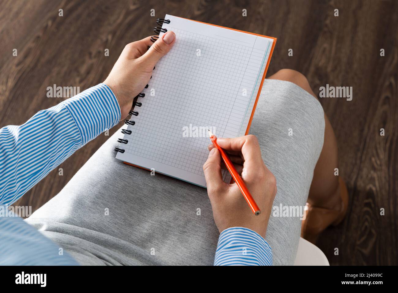 Business woman with notebook Stock Photo - Alamy