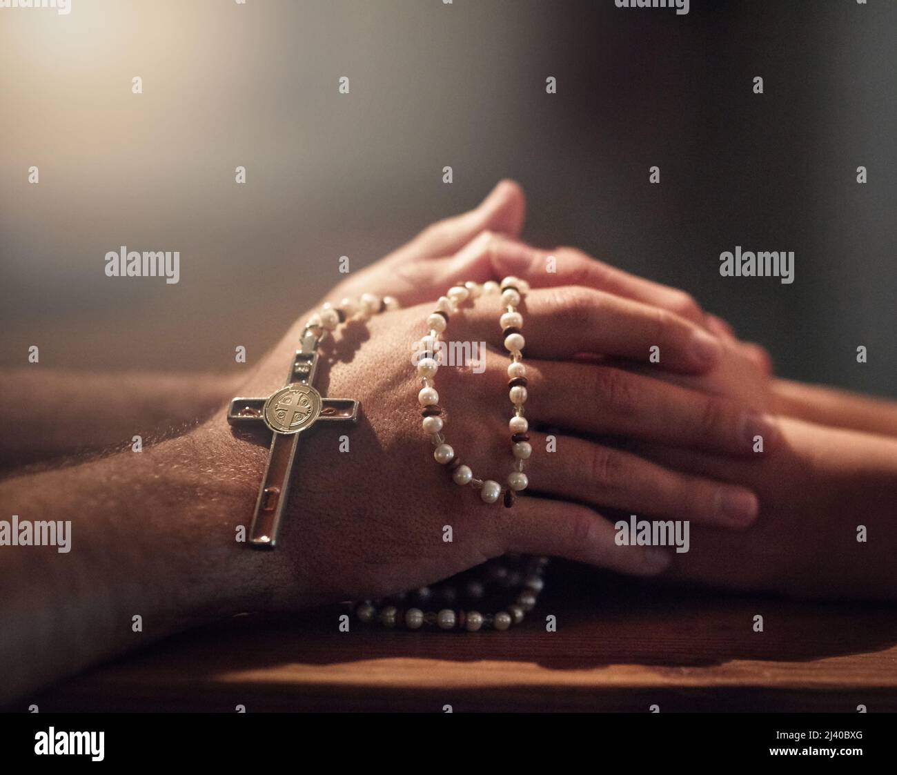 Two people praying together hi-res stock photography and images - Alamy