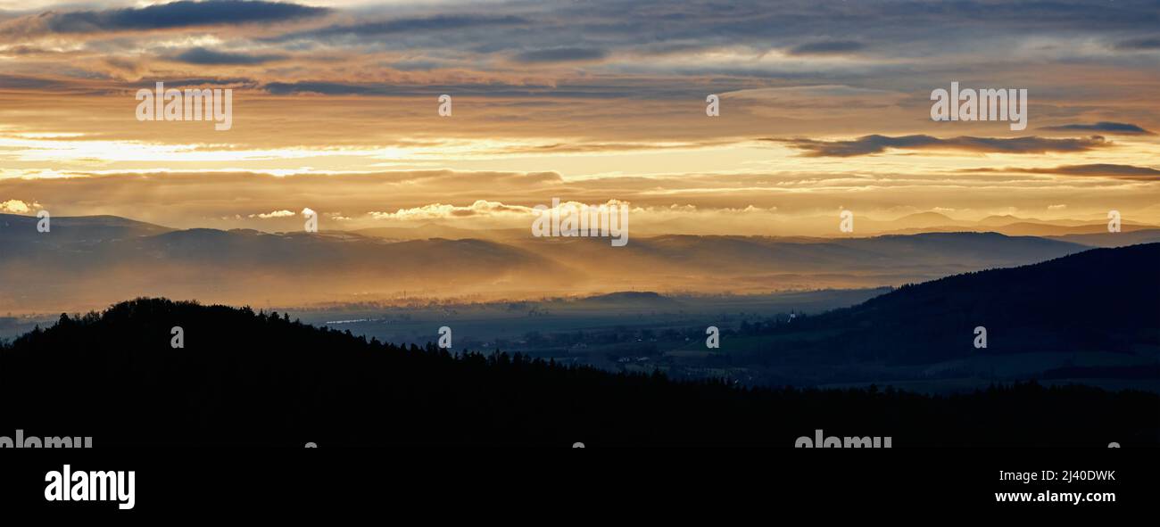 Sunset with dramatic cloudy sky over mountains shape, beautiful nature ...