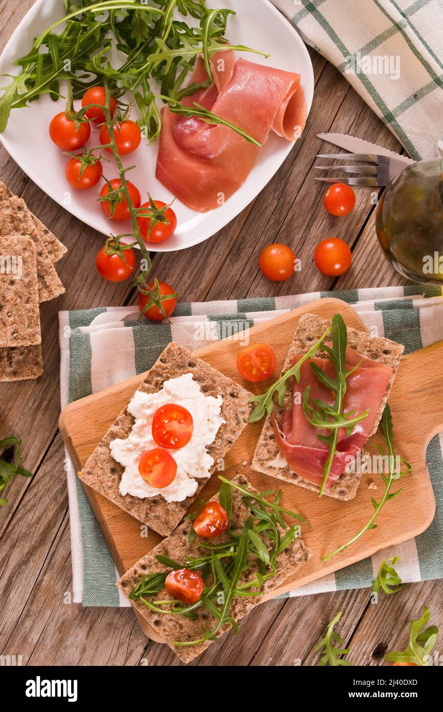 Crispy rye bread with sesame seeds, ham and cottage cheese Stock Photo ...