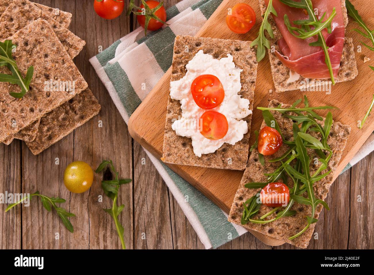 Crispy rye bread with sesame seeds, ham and cottage cheese Stock Photo ...