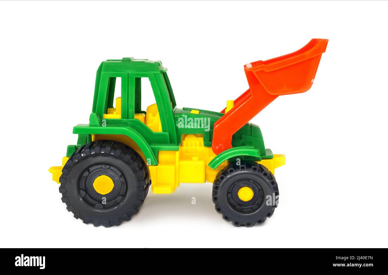 colorful plastic toy wheeled tractor loader excavator, isolated Stock ...