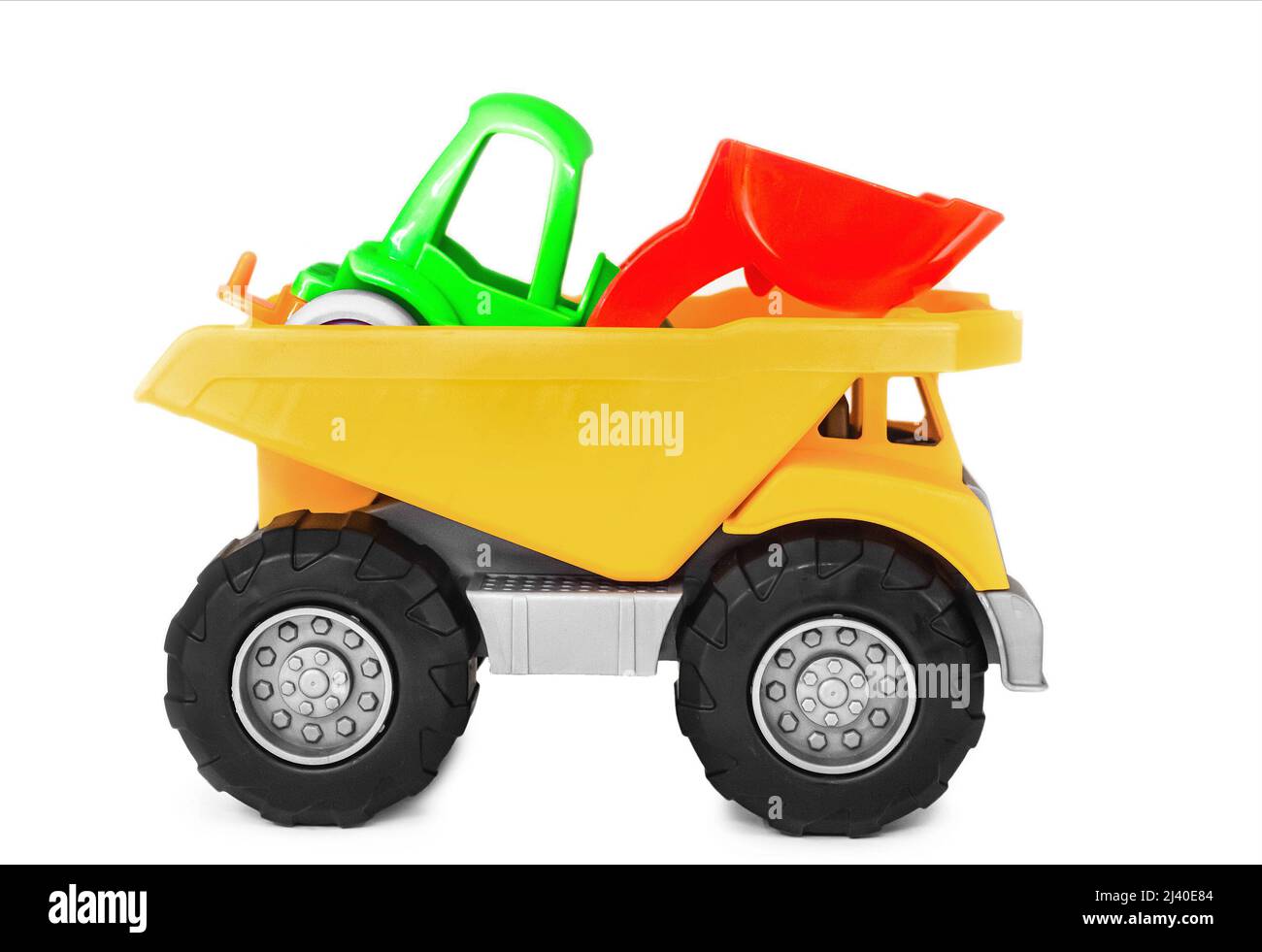 yellow plastic toy big mining tipper dumper truck, on white Stock Photo ...