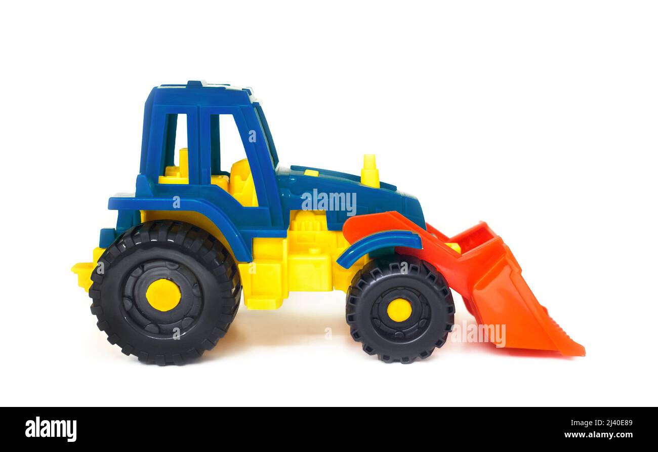 colorful plastic toy wheeled tractor loader excavator, isolated Stock ...