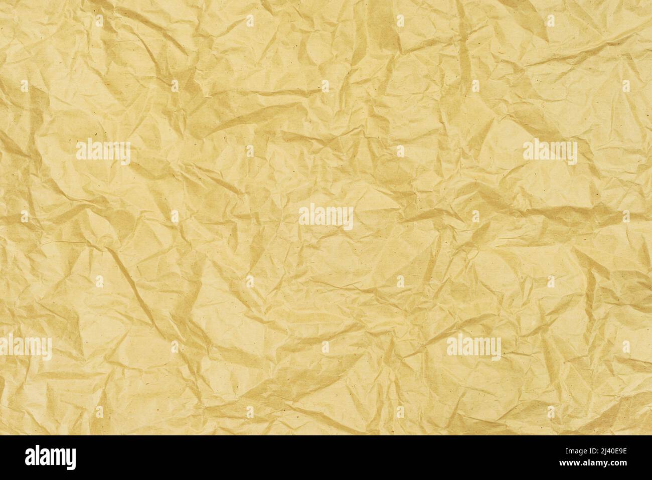 texture background of crumpled golden craft paper Stock Photo - Alamy