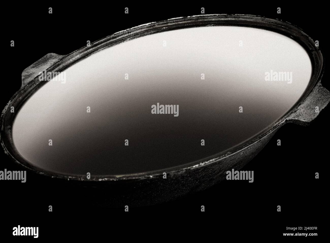empty cast iron cauldron in dark Stock Photo - Alamy